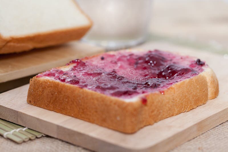 Bread with blueberry jam stock image. Image of ingredient - 106389361