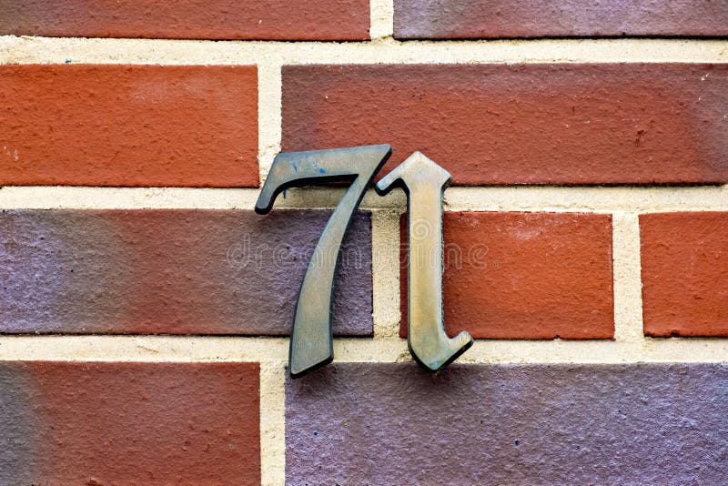 Close-up of the Brick Wall with the Number 71 on it Stock Image - Image ...