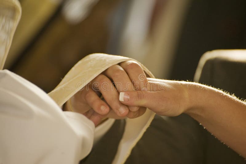 Close Up of Bride and Groom Being Blessed Stock Image - Image of ...