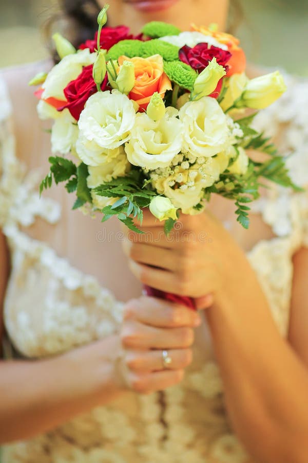 Close Up of Bride Holding Flower Stock Photo - Image of beautiful ...
