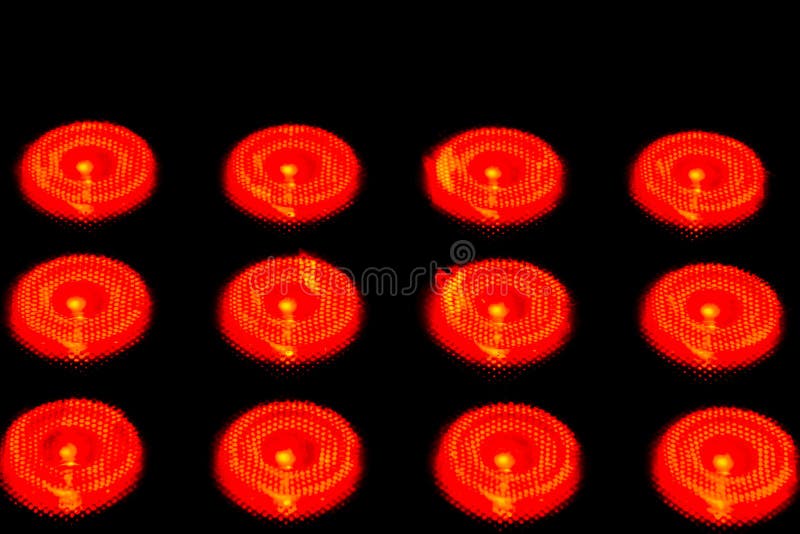 Close Up Bright Red Neon Colored Circular Lights in a Row on a Dark ...