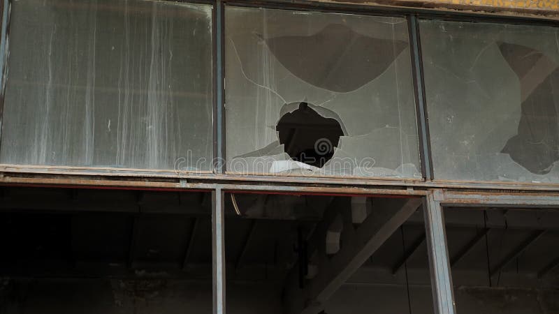 Close-up of Broken Dirty Windows in a Destroyed Building. Abandoned ...