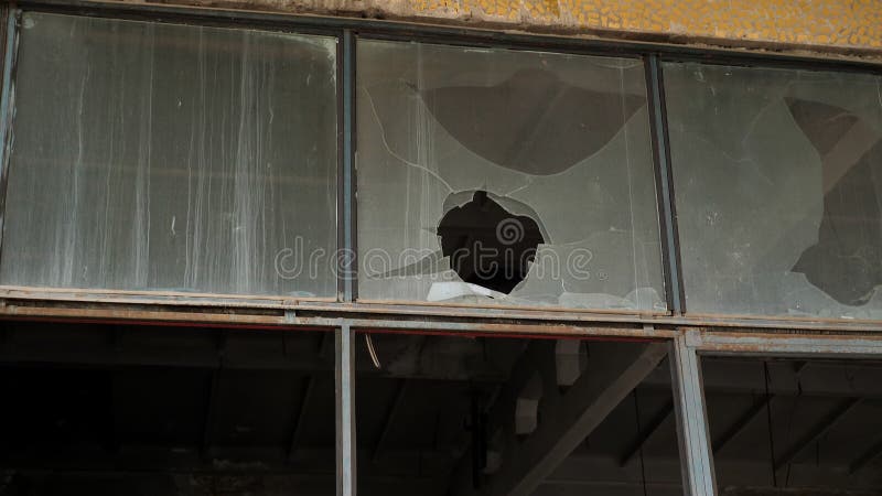 Close-up of Broken Dirty Windows in a Destroyed Building. Stock Video ...