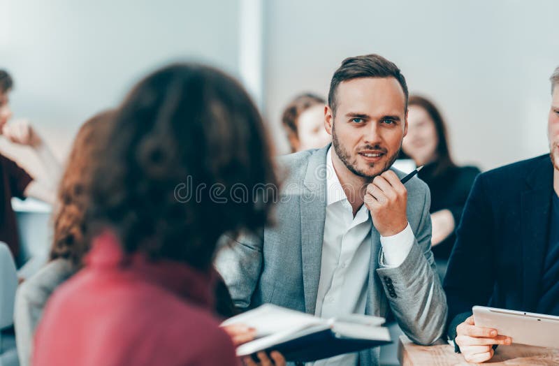 Close Up. Brooding Entrepreneur Sitting at Office Desk Stock Image ...
