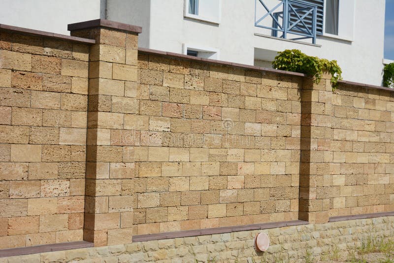 A Close-up on Brown Oyster Shell Foamed Brick, Limestone Brick Fence ...