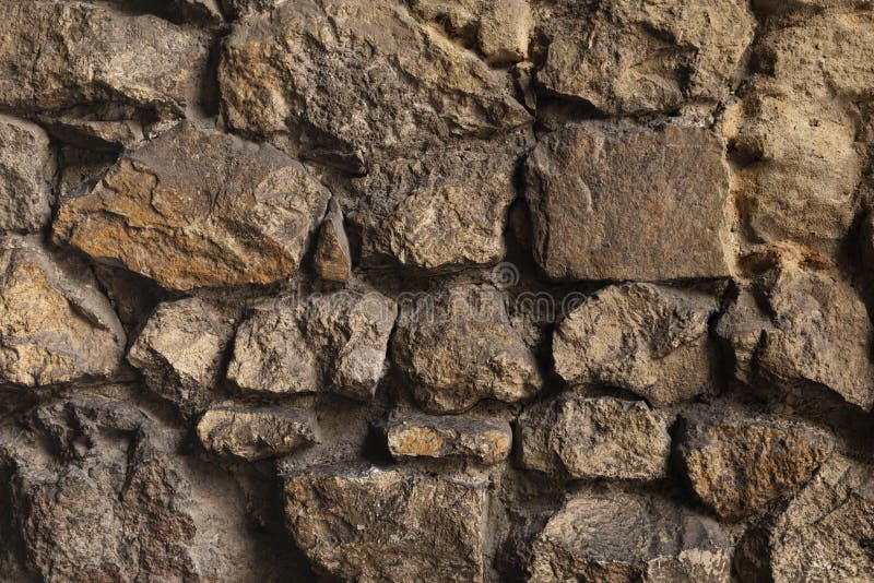 Close Up of a Brown Stone Wall Stock Photo - Image of construction ...