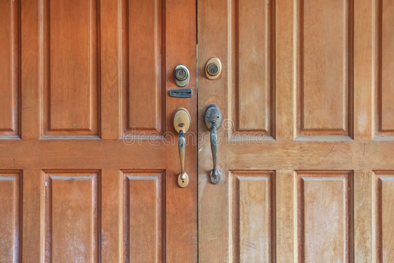 Close Up Brown Wooden Door with Key Lock and Handle Stock Image - Image ...