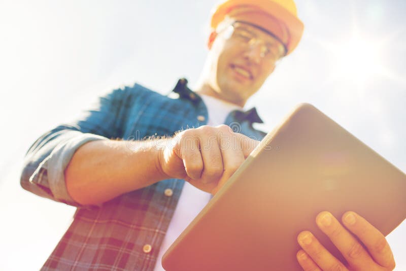Close Up of Builder in Hardhat with Tablet Pc Stock Photo - Image of ...