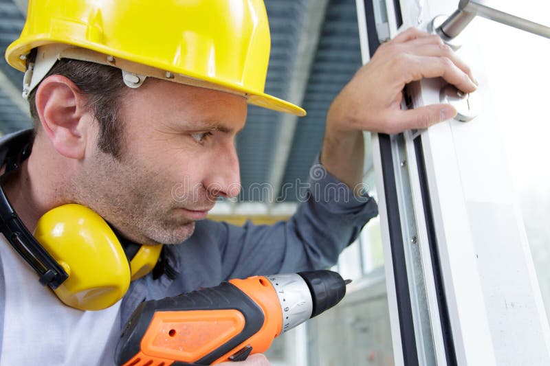 Close Up Builder Using Drill Stock Image - Image of decorate, curtain ...