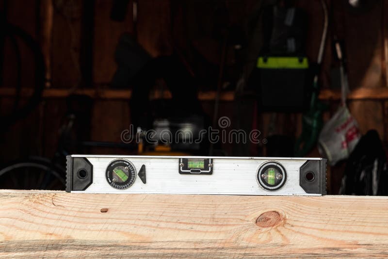 Close-up of a Building Metal Level, a Ruler Lying on the Boards ...