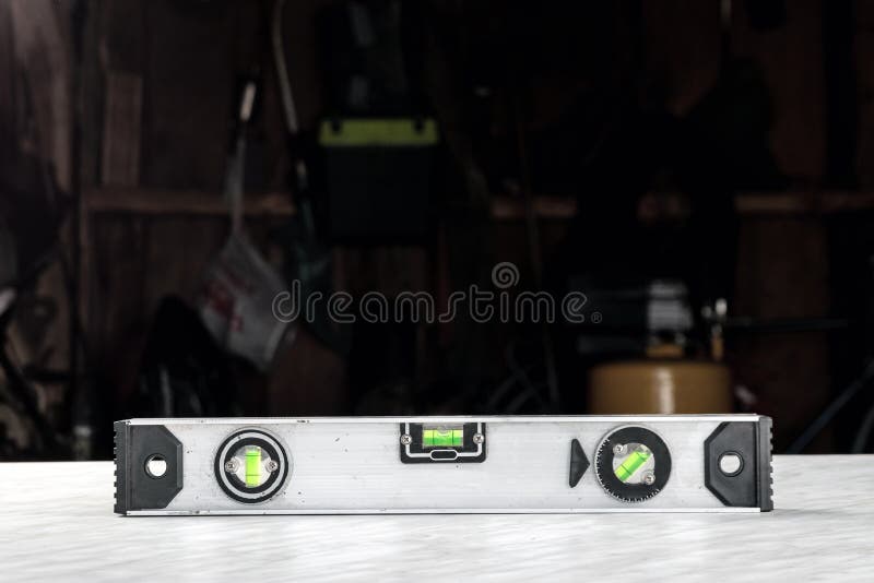 Close-up of a Building Metal Level, a Ruler Lying on the Boards ...