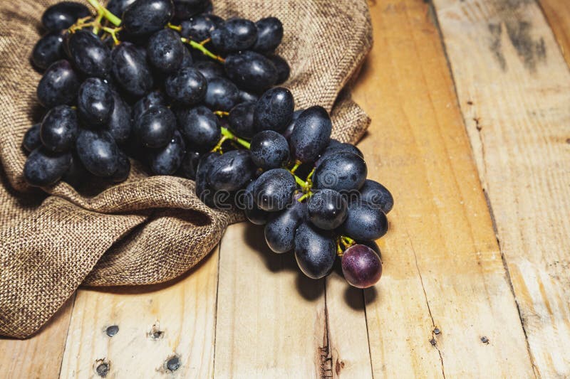 Close-up of a Bunch of Grapes Over a Table Stock Photo - Image of sweet ...