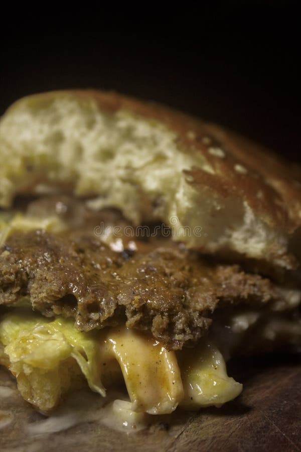 Close Up of Burger and Beef in a Dark Room Stock Photo - Image of ...