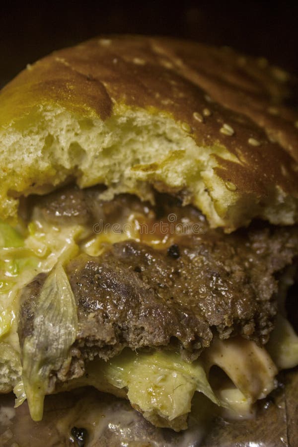 Close Up of Burger and Beef in a Dark Room Stock Photo - Image of ...