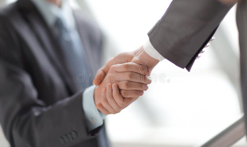 Close Up.business Handshake on Blurred Office Background Stock Image ...