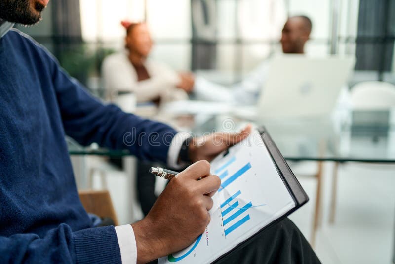 Business Man Analyzing a Financial Document . Close-up. Stock Photo ...
