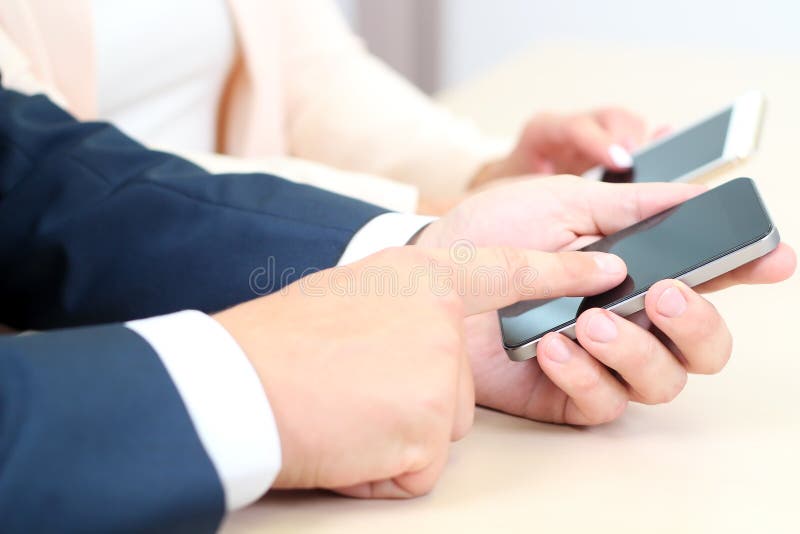 Close Up of a Business Men Using Mobile Smart Phones Stock Image ...
