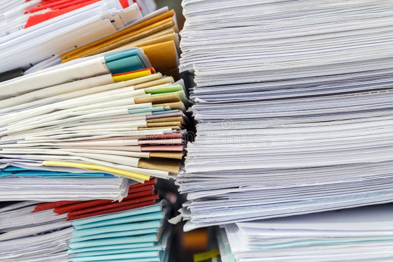 Close Up of Business Papers Stack on Desk. Pile of Unfinished Documents ...
