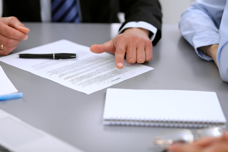 Business People Discussing Contract During Meeting Stock Photo - Image ...