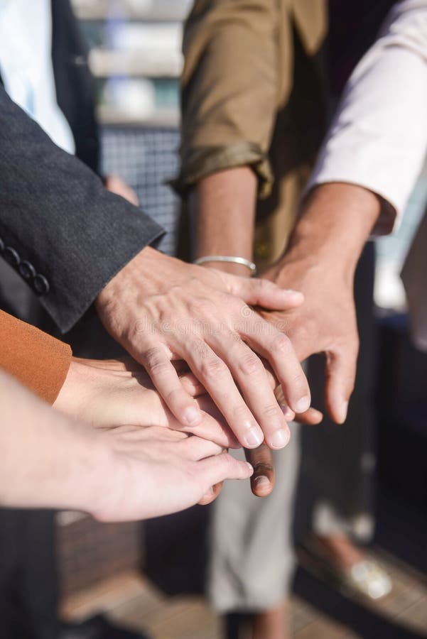 Close-up of Business People Putting Hands Together Stock Photo - Image ...