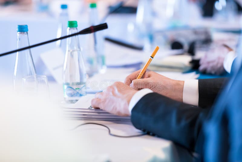 Close Up of Business People Taking Notes Stock Photo - Image of ...