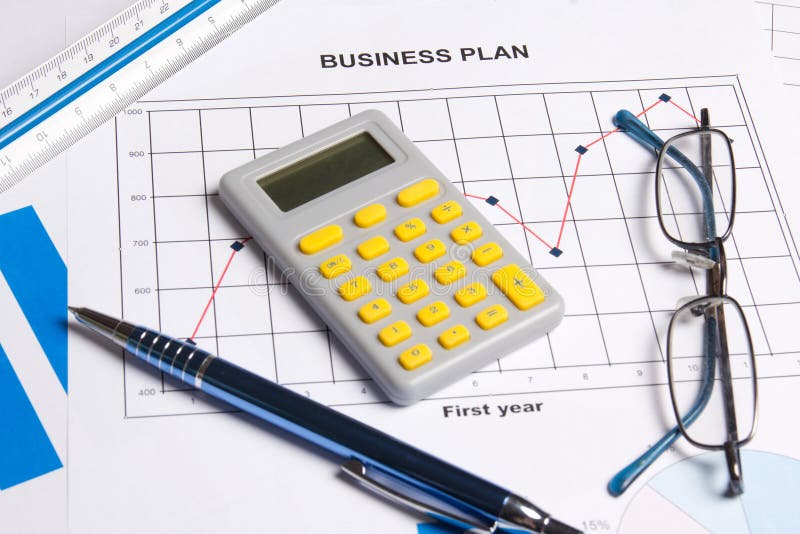 Close Up of Business Plan with Graphs, Charts and Calculator Stock ...