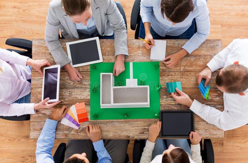 Close Up of Business Team with Project Layout Stock Photo - Image of ...