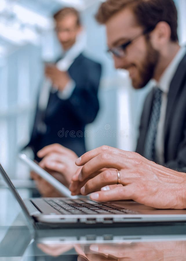 Close Up.business Team Using Gadgets in a Modern Office Stock Photo ...