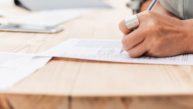 Close Up. Business Woman Writing while Sitting at the Table Stock Image ...