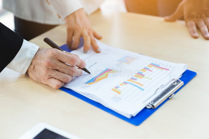 Close Up Businessman Checking Paperwork Graph Data for Work Success ...