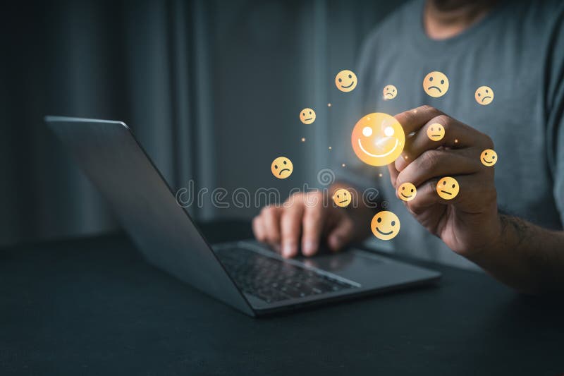 Close-up Businessman Hand Using Laptop with Floating Emoji Faces ...