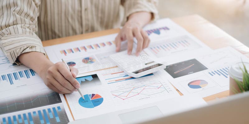 Close Up of a Businessman Holding Graph Paper and Pen Stock Photo ...