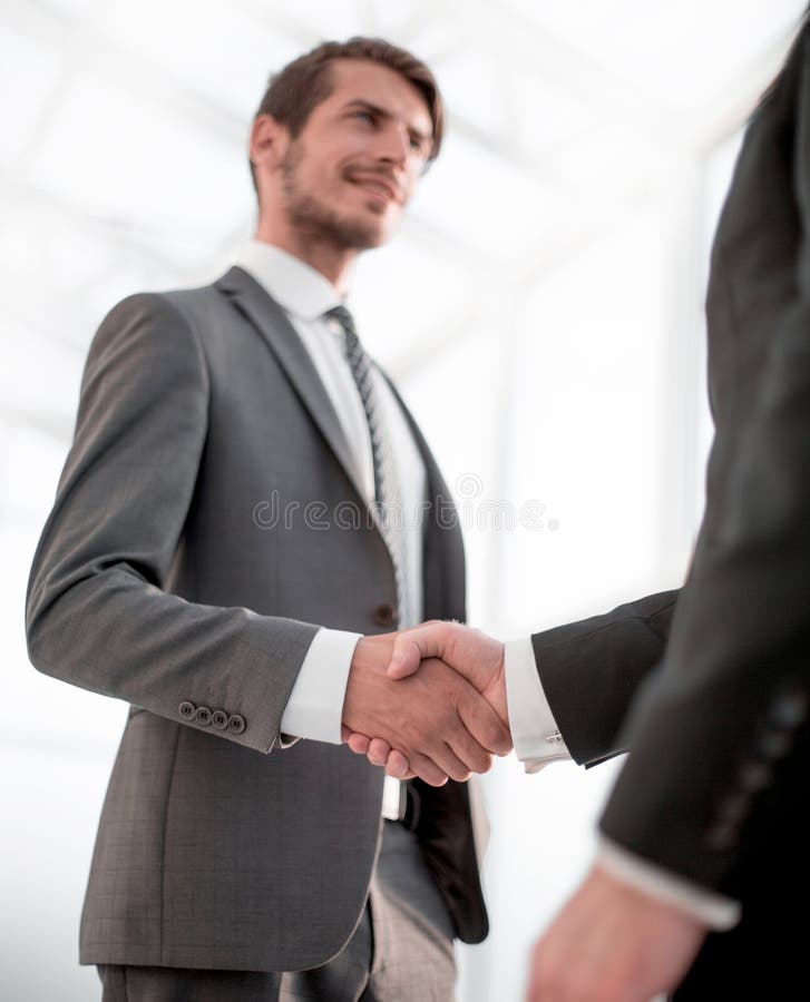 Close Up. Businessman Shakes Hands with His Partner Stock Photo - Image ...