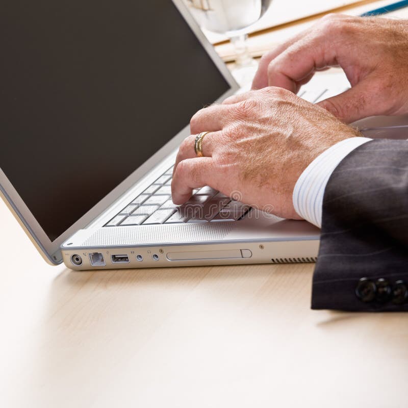 Businessman Typing on Computer at Desk Stock Image - Image of typing ...