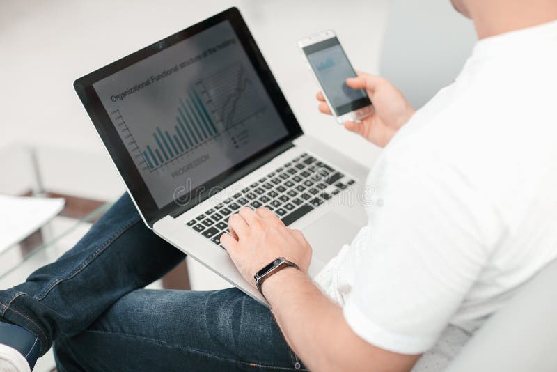 Close Up. Businessman Using Smartphone and Laptop Stock Photo - Image ... Close Up. Businessman Using Smartphone and Laptop Stock Photo - Image ...