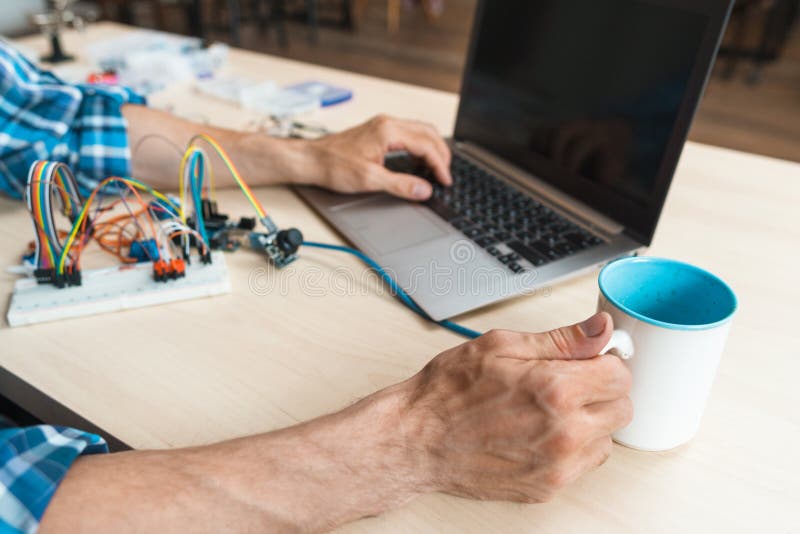 Close-up of Busy Programmer Hand with Coffee Cup Stock Image - Image of ...