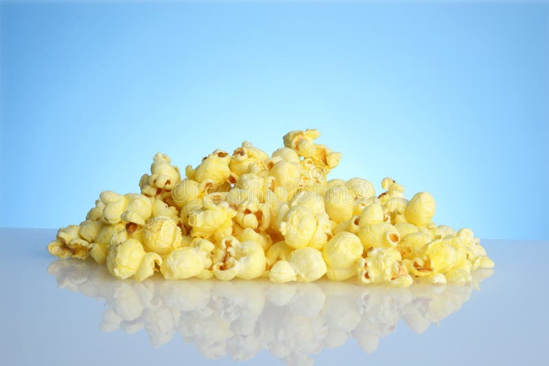 Close Up Buttered Popcorn with Blue Background Stock Image - Image of ...