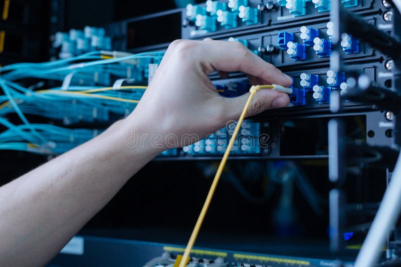 Close Up of a Cable Being Put into Switch Stock Photo - Image of ...