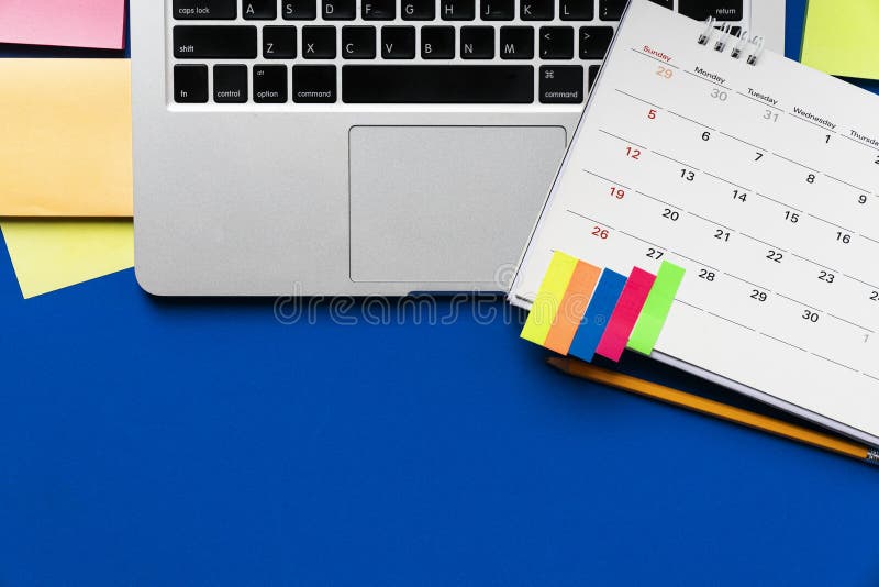 Close Up of Calendar and Computer on the Table Stock Photo - Image of ...
