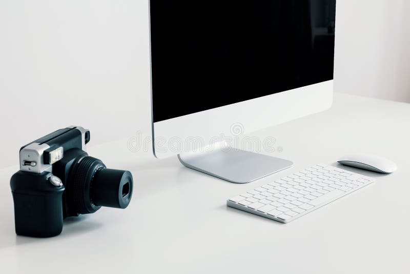 Camera and Desktop Computer on White Desk with Lamp in Freelancer`s ...