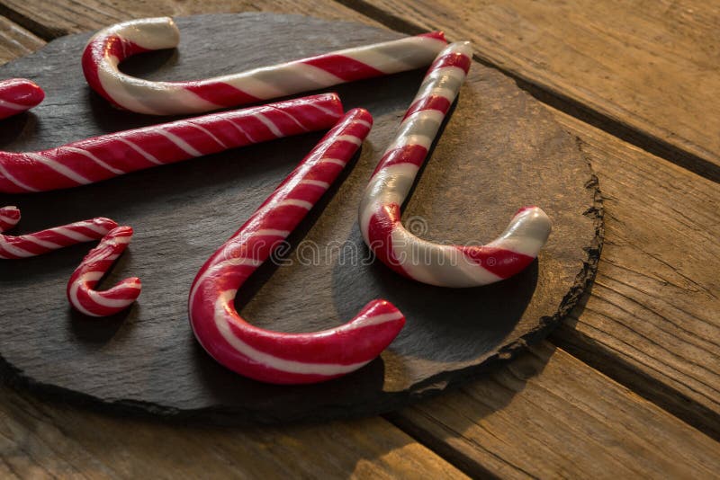 Close Up of Candy Canes on Wood Stock Photo - Image of medium, objects ...