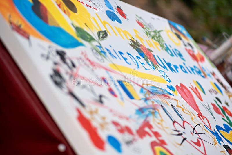 Close-up of a Canvas with Many Different Drawings on it in Support of ...