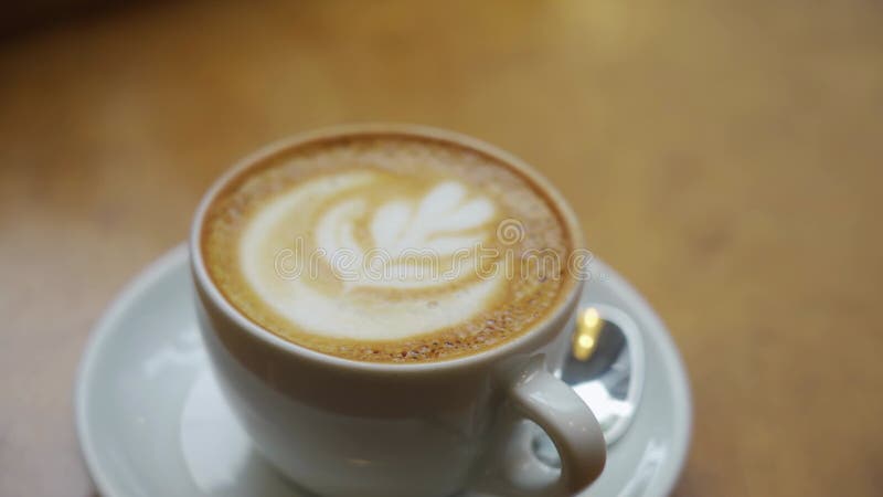 Close-up of a Cappuccino Coffee on a Table in a Cafe Stock Footage ...