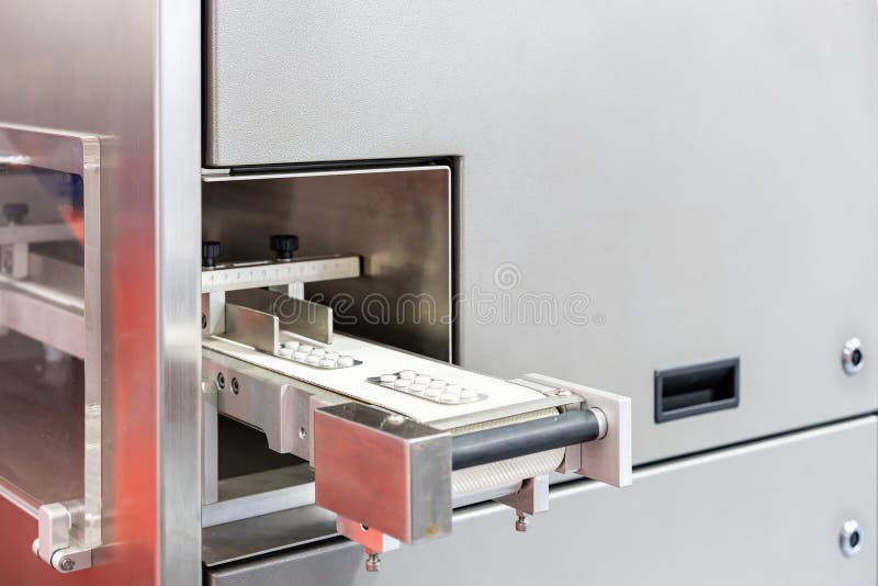 Close Up Capsule in Blister Pack or Package on Belt Conveyor after ...