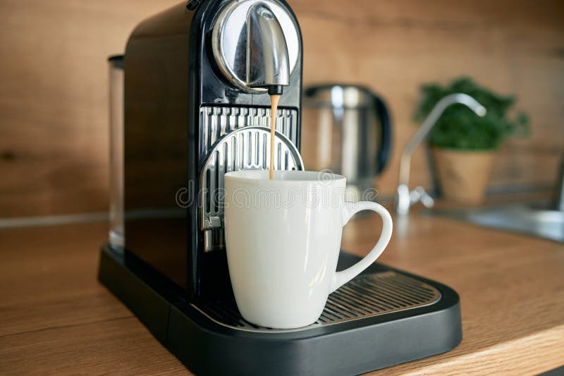Close-up of a Capsule Coffee Machine Making Espresso while Making ...