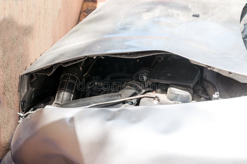 Close Up of Car Crash Accident with Damaged Front End Crushed in To the ...
