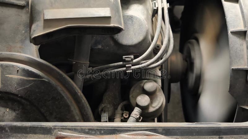 Close-up of a Mechanical Engine with Wires and Components Moving Parts ...