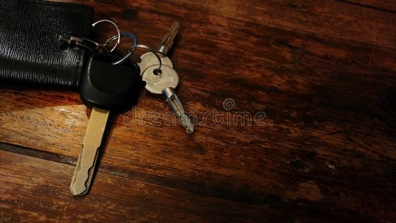 Close-up Car Keys on a Wooden Table Top View Stock Image - Image of ...
