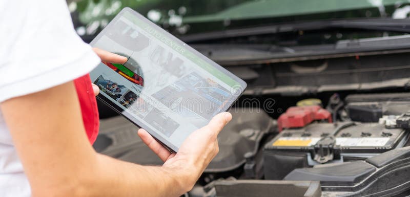 Close-up of a Car Mechanic Using Digital Tablet. Stock Photo - Image of ...