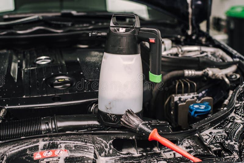 Close-up of a Car with an Open Hood and Cleaning Tools Stock Image ...